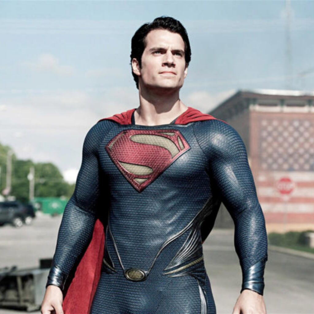 Handsome guy Henry Cavill wearing the famous superhero Superman costume ...